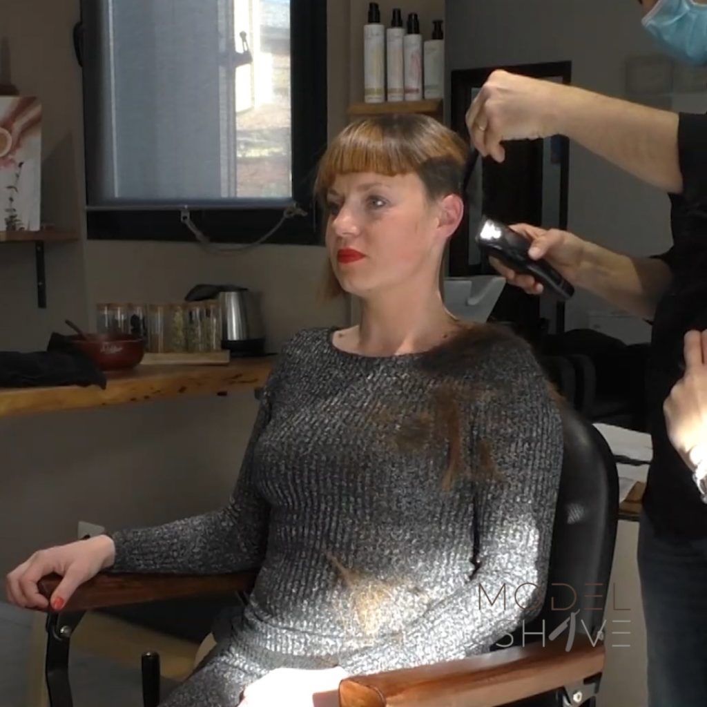 Woman with long hair makes an appointment to get her head shaved bald ...