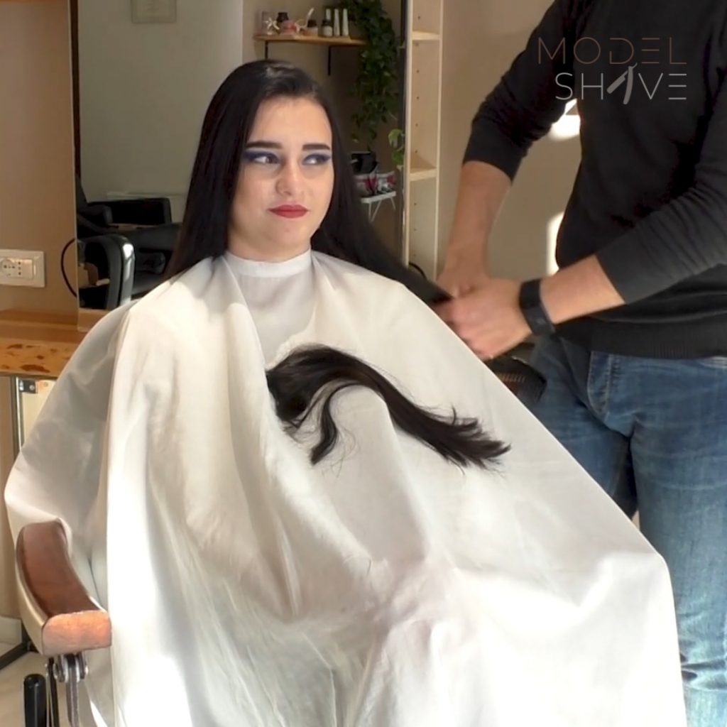 Girl with long silky black hair gets a smooth bald head. - Model Shave