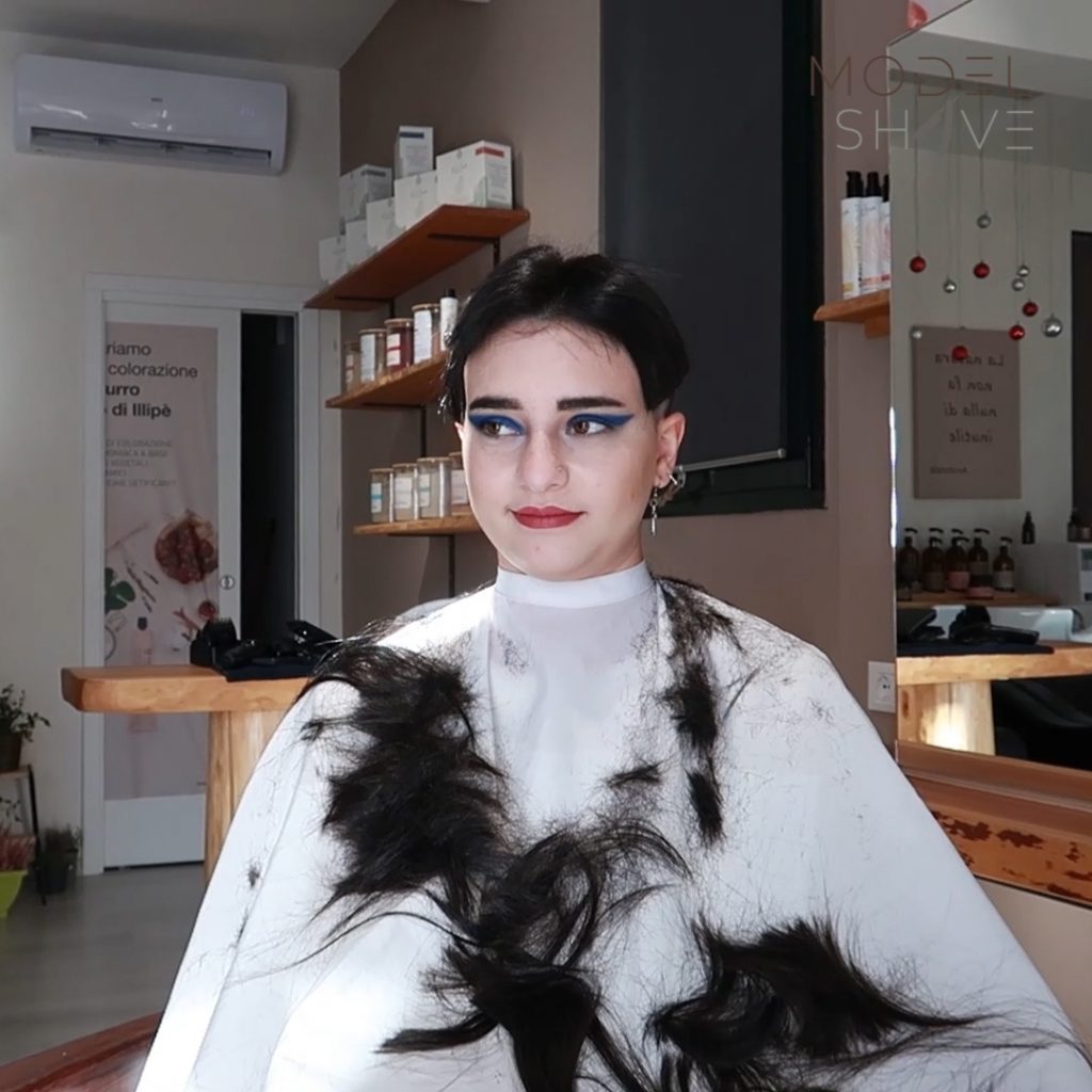 Girl with long silky black hair gets a smooth bald head. - Model Shave