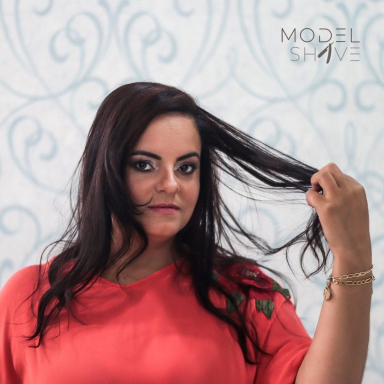 Brunette woman gets a full head shave from our barberette. - Model Shave
