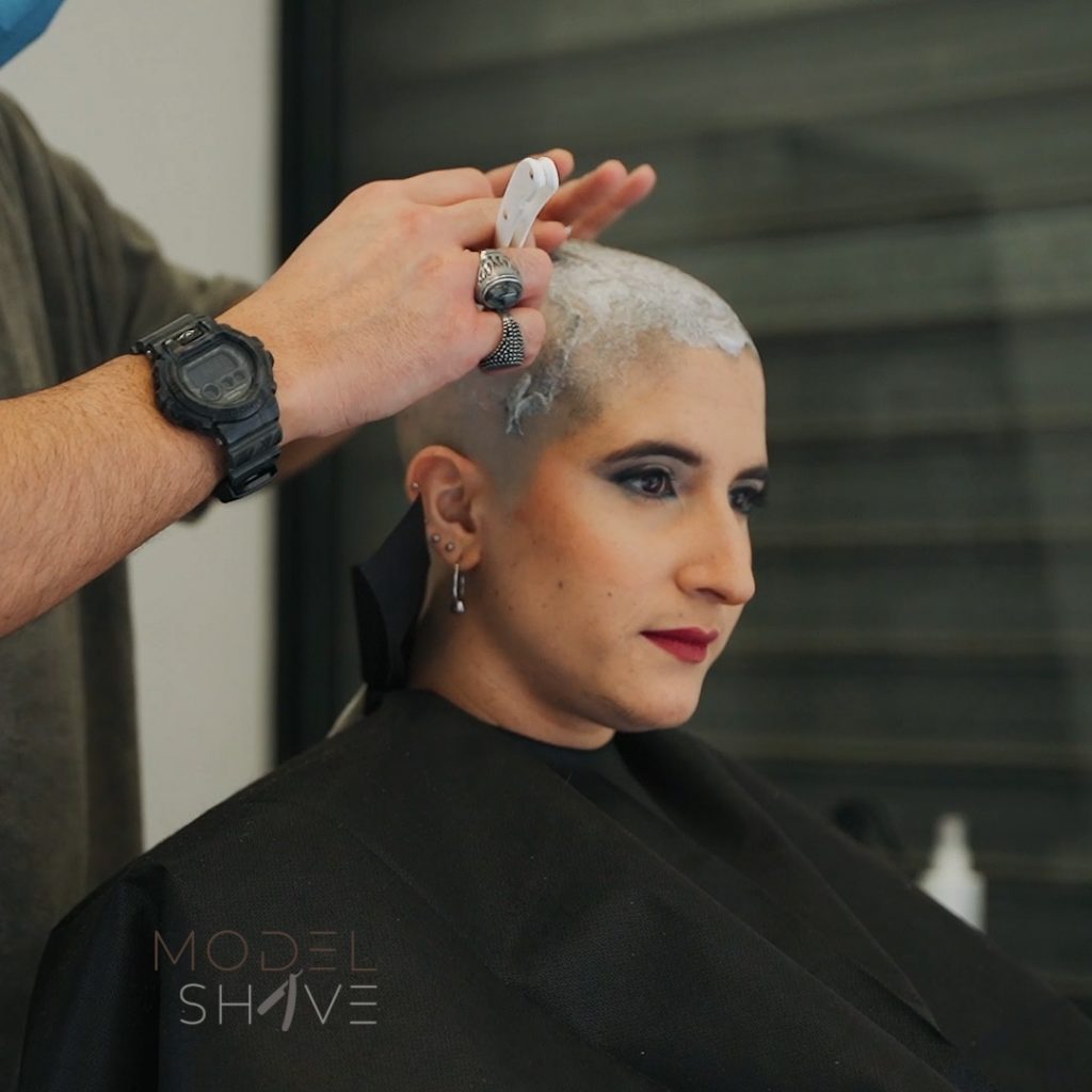 Girl headshave from long hair in barbershop. - Model Shave