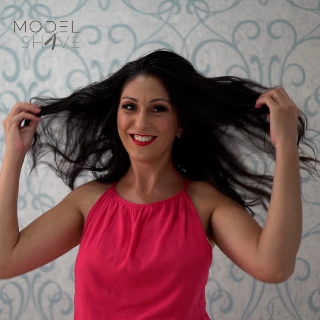 The woman in red visits the barberette. - Model Shave