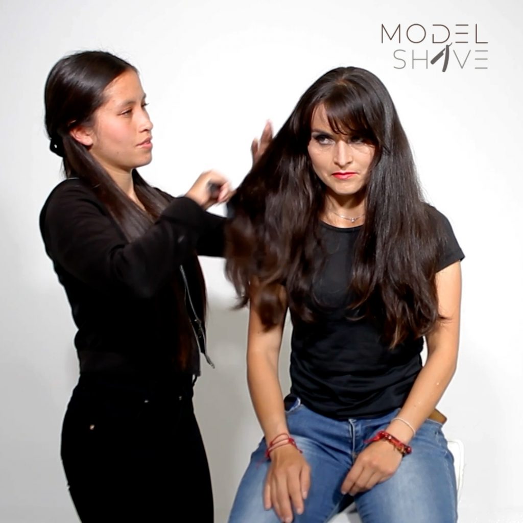 The barberette and the model both have smooth and shiny hair, in the ...